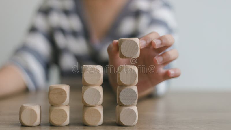 Businesswomen Stack Blank Wooden Cubes on the Table with Copy Space ...