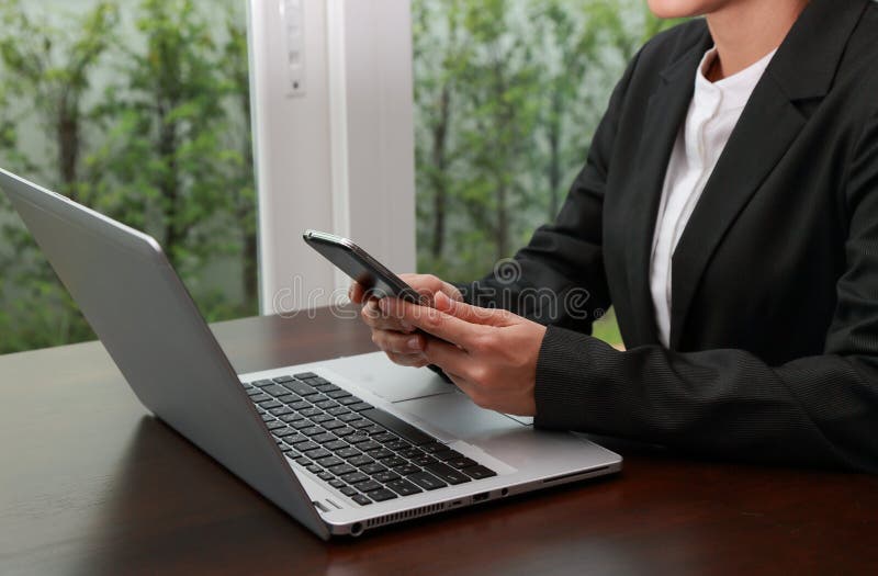 Businesswomen Use Smartphone for the Work in the Workplace Stock Image ...