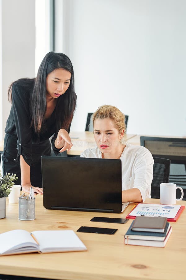 Businesswomen Using Laptop at Office Stock Image - Image of internet ...