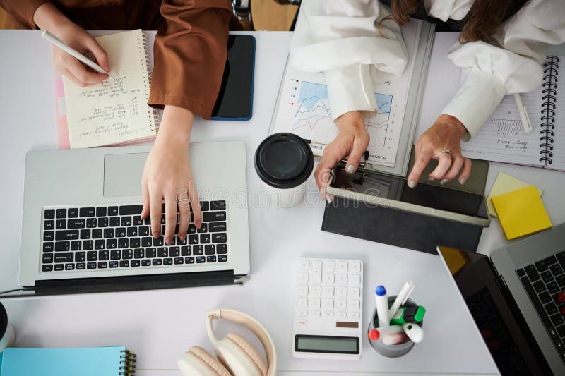 Businesswomen Working in Team Over Project Stock Image - Image of ...