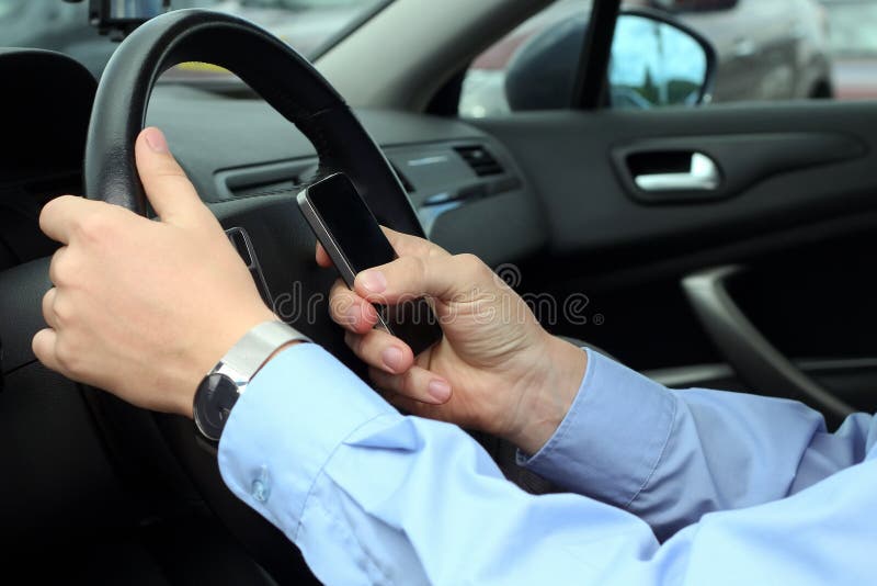 Businwssman Using Mobile Phone while Driving the Car Stock Photo ...