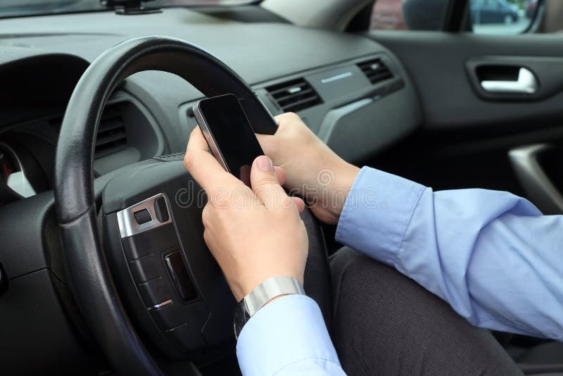 Businwssman Using Mobile Phone while Driving the Car Stock Photo ...