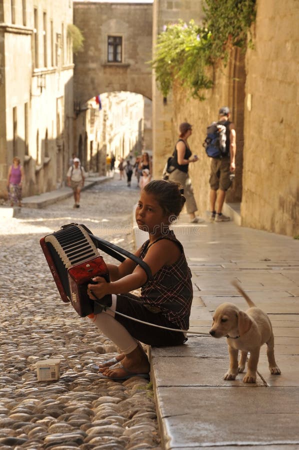Busker in street editorial stock photo. Image of child - 23402208