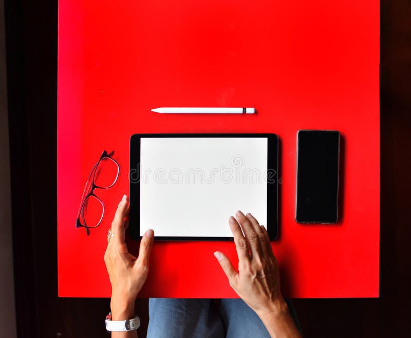 A Bussiness Woman Working from Home by Tablet on Red Table. Concept of ...