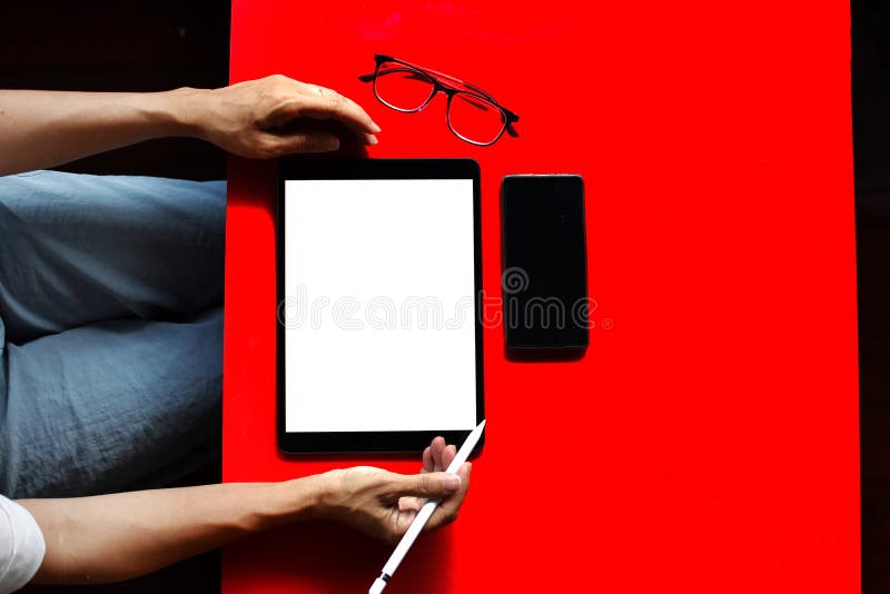 A Bussiness Woman Working from Home by Tablet on Red Table. Concept of ...