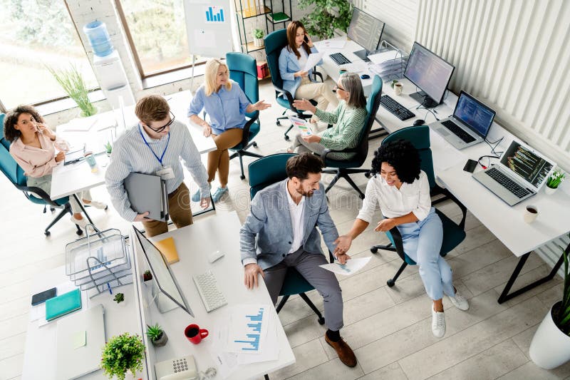 Diverse Team of Professionals Collaborating in a Modern Office Space ...