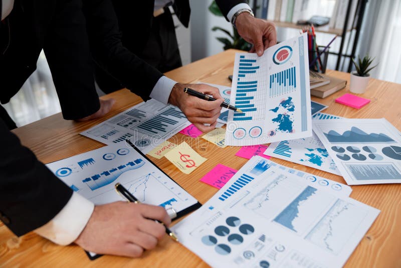 Busy Analyst Team Discuss Financial Data on Dashboard with Post Note ...