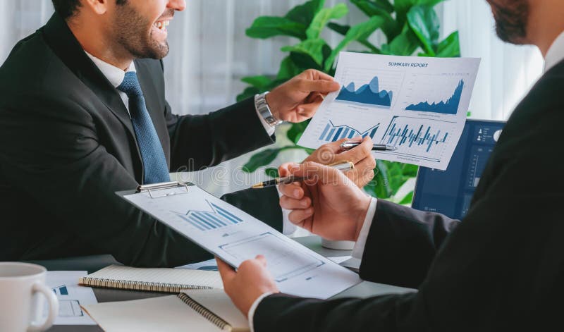 Busy Analyst Team Discussing Financial Data on Laptop. Fervent Stock ...