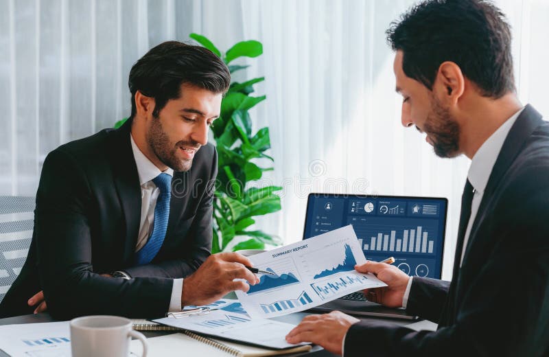 Busy Analyst Team Discussing Financial Data on Laptop. Fervent Stock ...