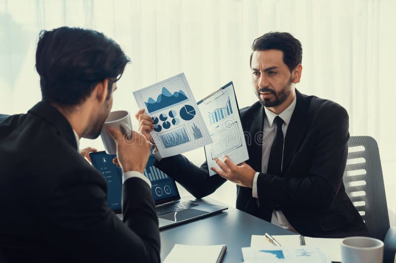 Busy Analyst Team Discussing Financial Data on Laptop. Fervent Stock ... Busy Analyst Team Discussing Financial Data on Laptop. Fervent Stock ...