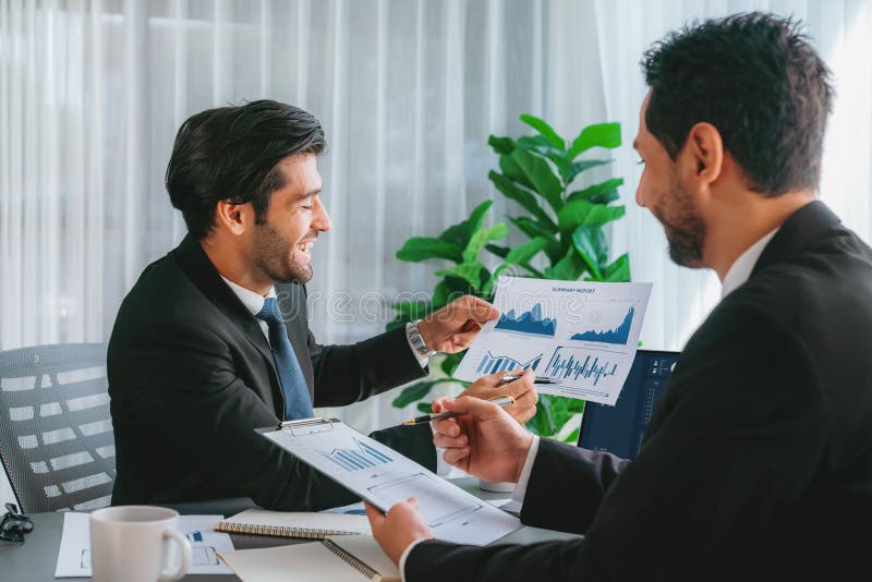 Busy Analyst Team Discussing Financial Data on Laptop. Fervent Stock ...