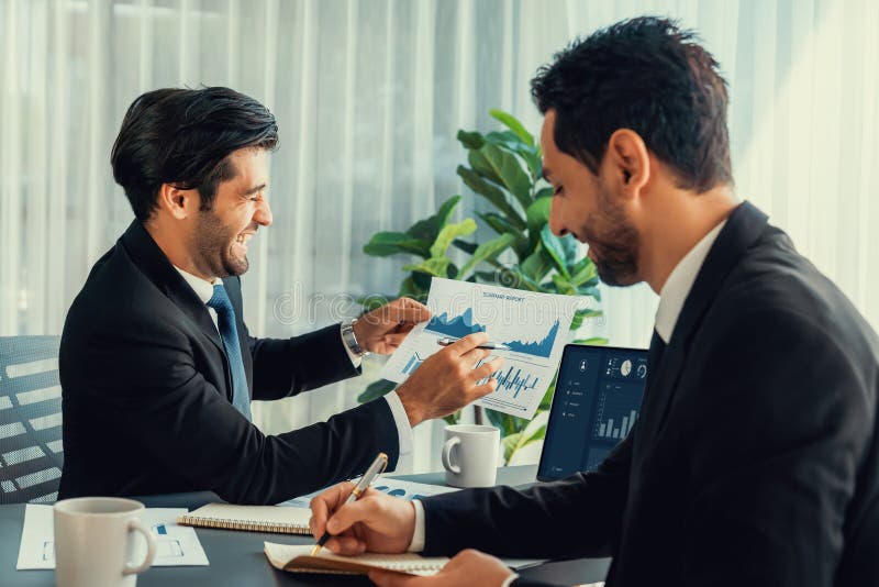 Busy Analyst Team Discussing Financial Data on Laptop. Fervent Stock ...