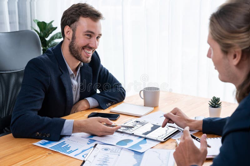 Busy Analyst Team in Office Analyzing Financial Data Analysis by Tablet ...