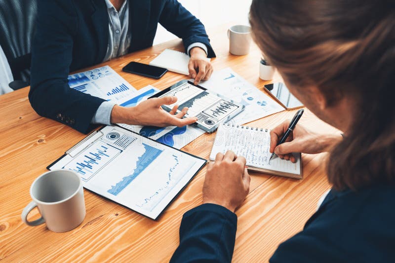 Busy Analyst Team in Office Analyzing Financial Data Analysis by Tablet ...