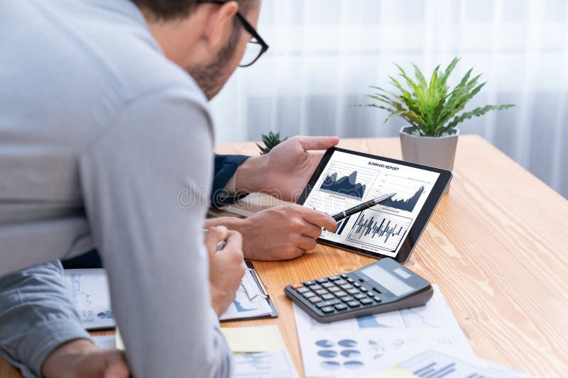Analyst Team in Office Analyzing Financial Data Analysis Papers. Entity ...