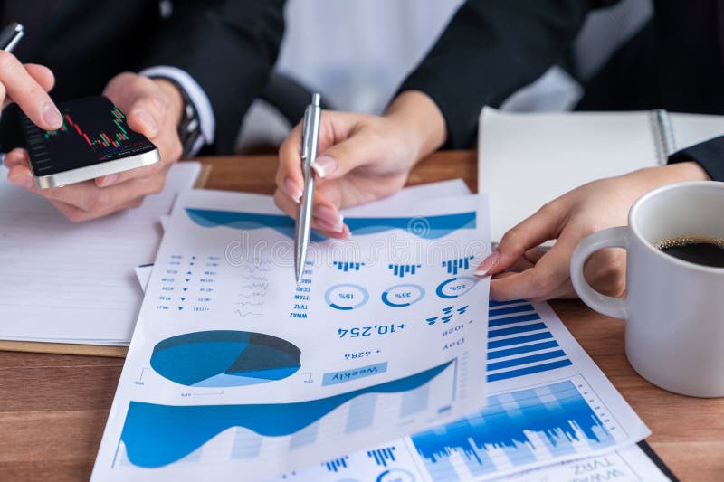 Busy Analyst Team in Office Discuss Data Analysis and Marketing ...