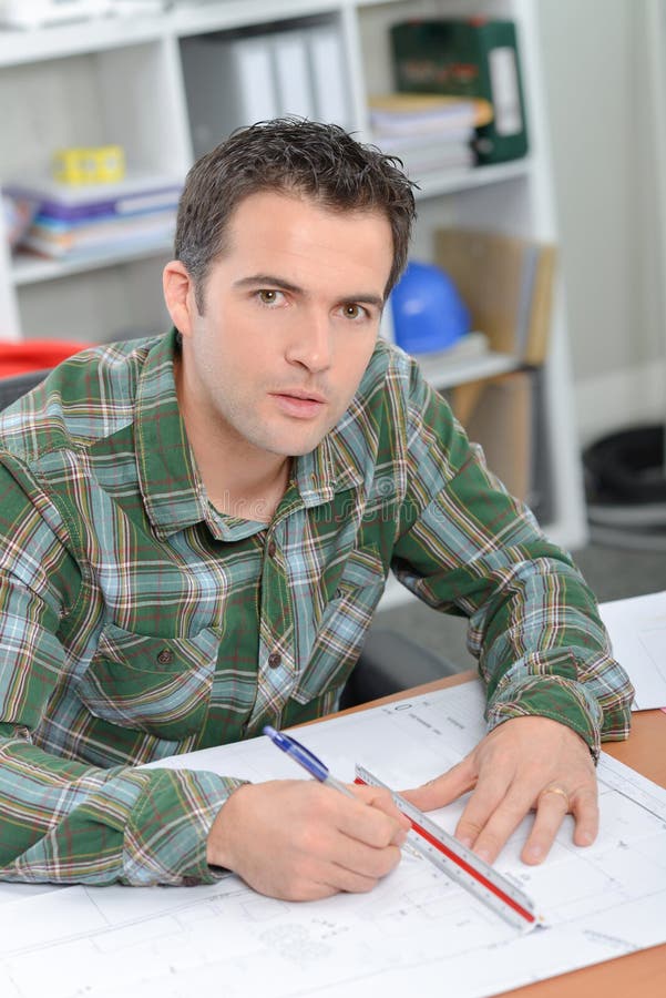 Busy architect in office stock image. Image of shelves - 260649413