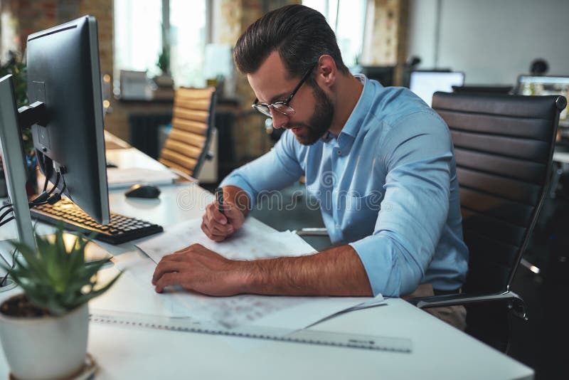 Busy Architect. Young Andsuccessfulbearded Man in Eyeglasses and Formal ... Busy Architect. Young Andsuccessfulbearded Man in Eyeglasses and Formal ...