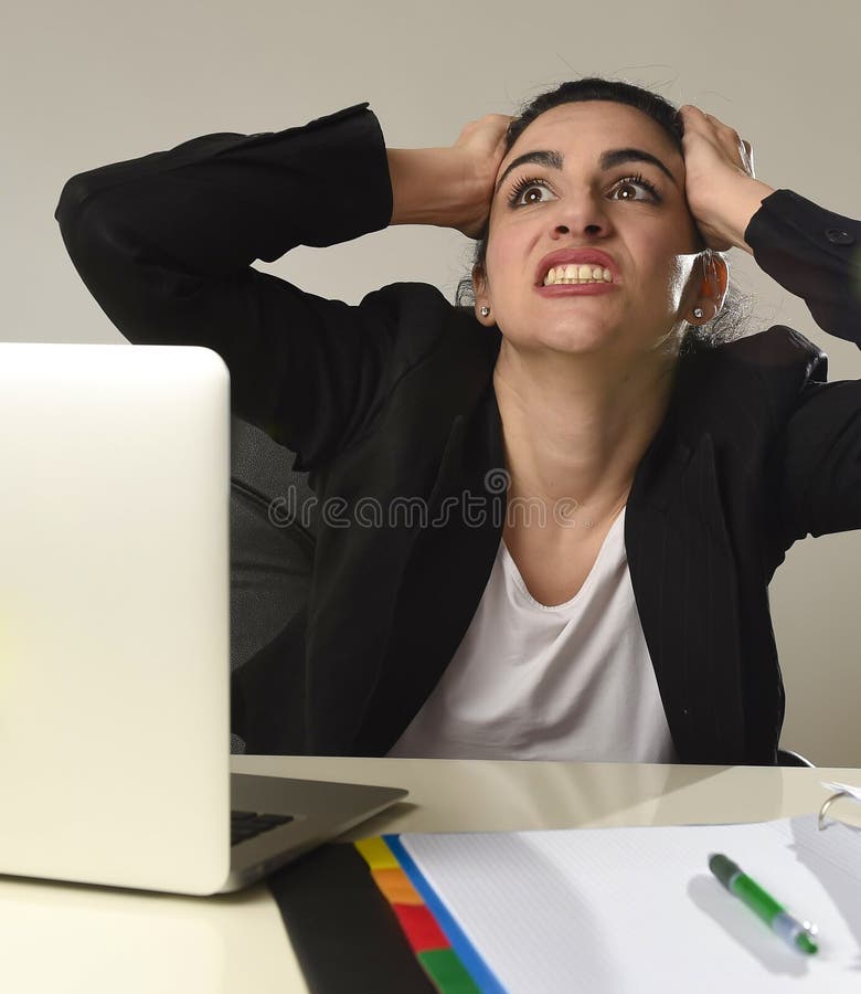 Busy Attractive Woman In Business Suit Working In Stress Screaming