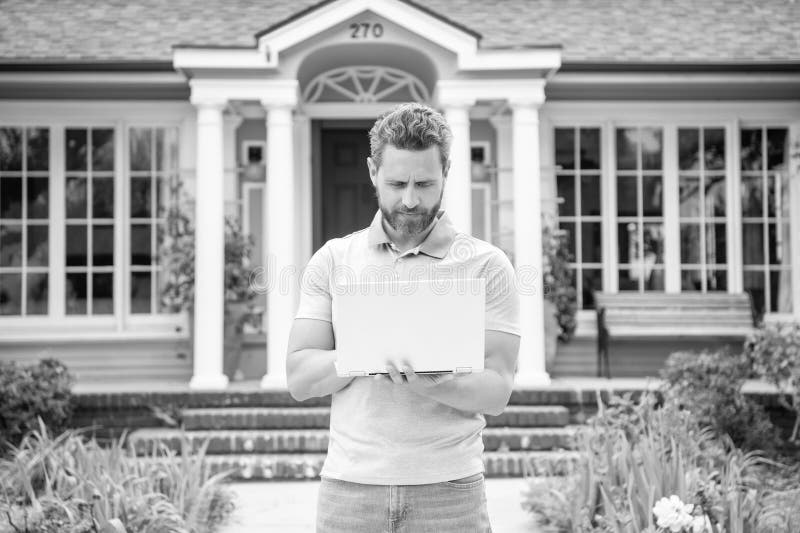 Busy Bearded Man Real Estate Agent Selling Or Renting House Online On
