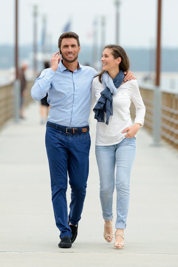 Busy Boyfriend Talking on Phone during Stroll Stock Image - Image of ...