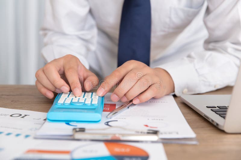 Busy business man at work stock image. Image of desk - 253933107