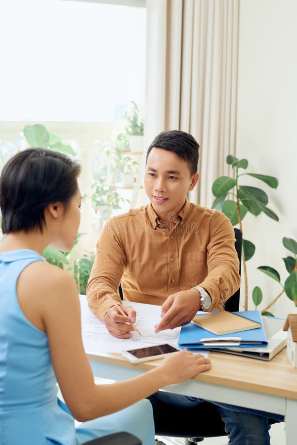 Busy Business People Working at Office with Architecture Design Stock ...