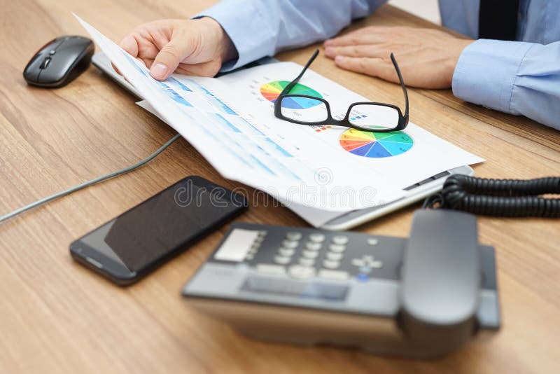 Busy Business People Analyzing Business Data and Calling Customers ...