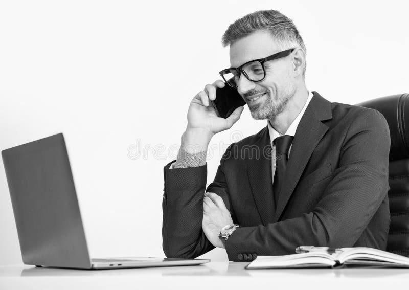 Busy Businessman in Eyewear Talking on Phone in Office with Computer ...