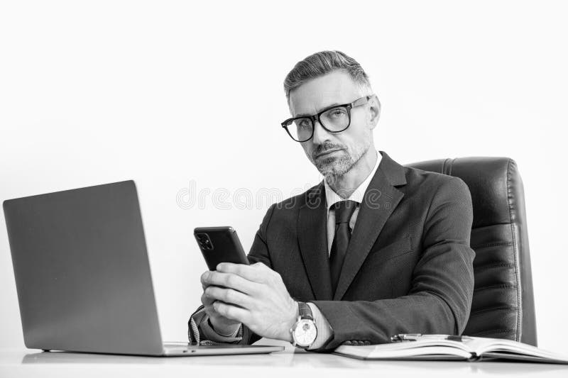 Busy Businessman in Eyewear Using Phone in Business Office with ...