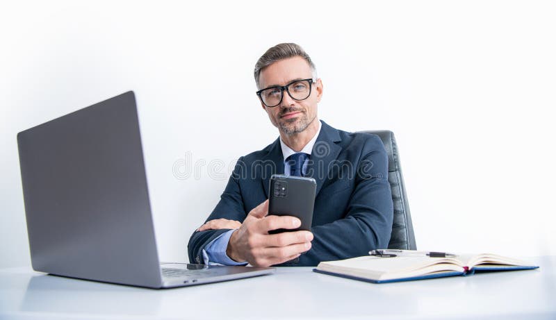 Busy Businessman in Eyewear Using Phone in Office with Laptop Stock ...