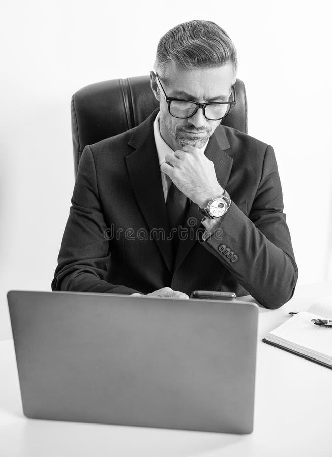Busy Businessman in Eyewear Using Smartphone in Office with Computer ...