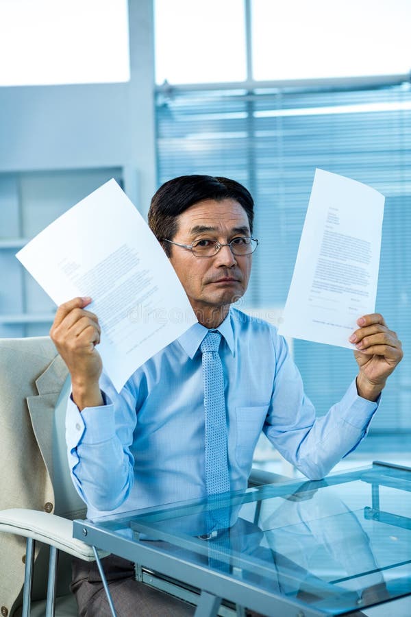 Man Showing Papers To Coworking Woman Stock Image - Image of company ...