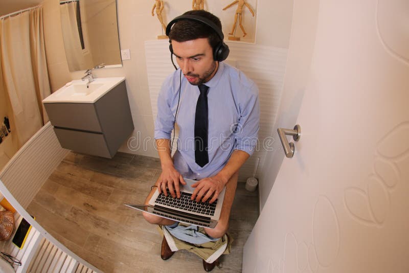 Busy Businessman Working from the Toilet Stock Image - Image of online ...