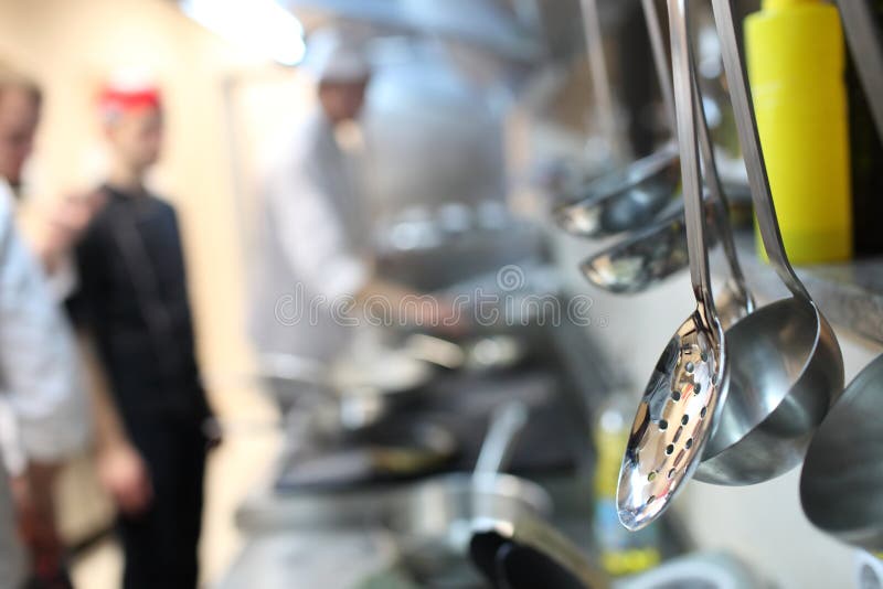 Busy Chefs at Work in the Restaurant Kitchen Stock Photo - Image of ...