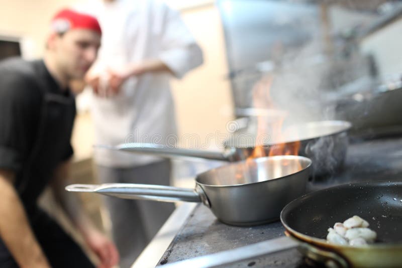 Busy Chefs at Work in the Restaurant Kitchen Stock Photo - Image of ...