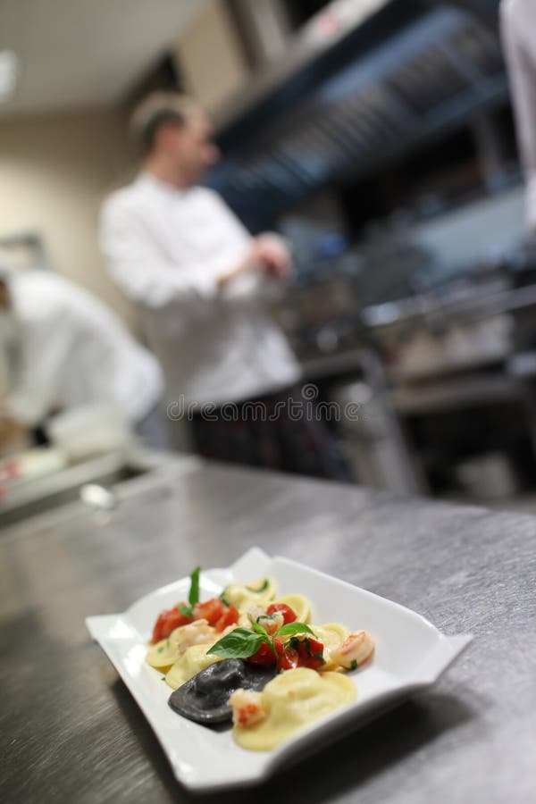 Busy Chefs at Work in the Restaurant Kitchen Stock Photo - Image of ...