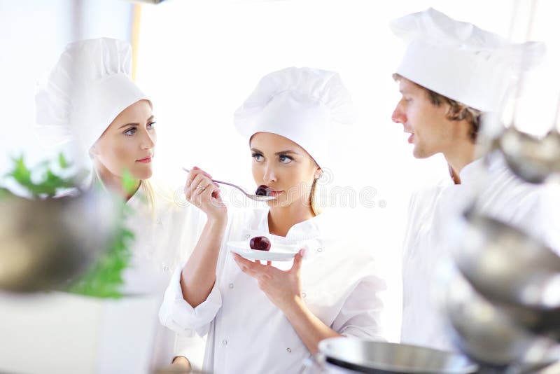 Busy Chefs at Work in the Restaurant Kitchen Stock Photo - Image of ...