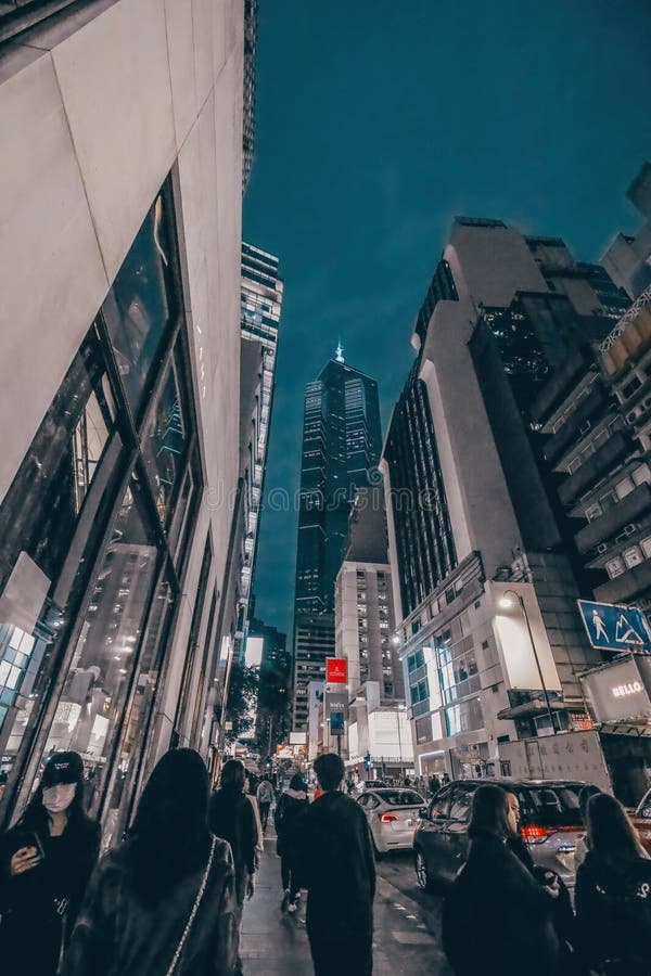 The Busy City Street at Night with Modern Architecture Dec 27 2023 ...