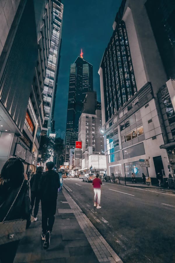 The Busy City Street at Night with Modern Architecture Dec 27 2023 ...