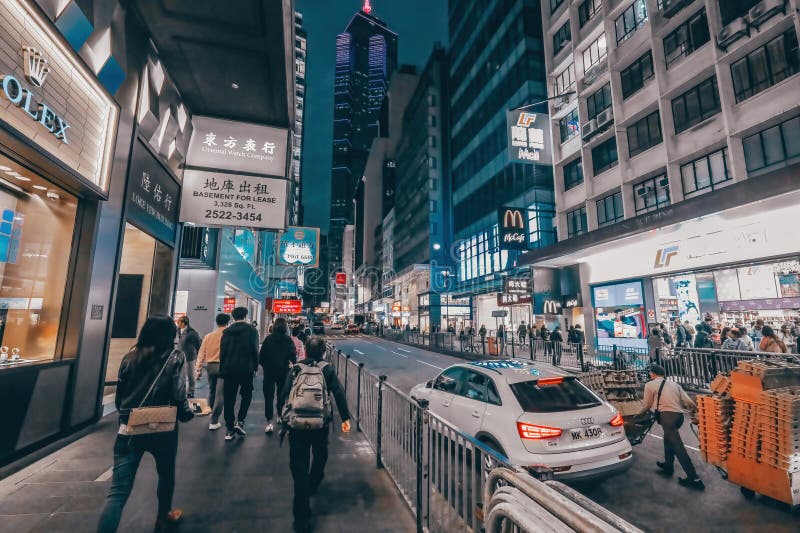 The Busy City Street at Night with Modern Architecture Dec 27 2023 ...