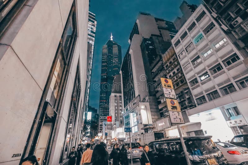 The Busy City Street at Night with Modern Architecture Dec 27 2023 ...