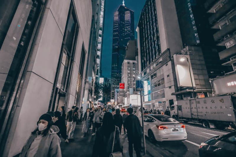 The Busy City Street at Night with Modern Architecture Dec 27 2023 ...