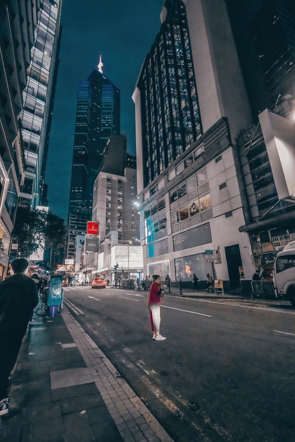 The Busy City Street at Night with Modern Architecture Dec 27 2023 ...