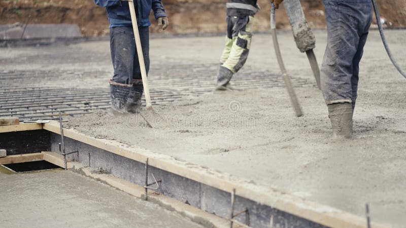 The Concrete Laying Process on a Construction Site Involves Various Key ...