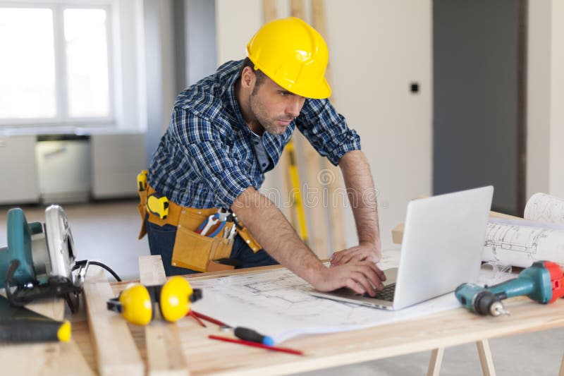 Busy construction worker stock image. Image of equipment - 39367527