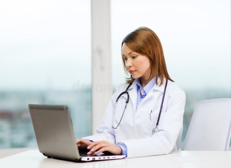 Busy Doctor with Laptop Computer Stock Image - Image of cute, laptop ...