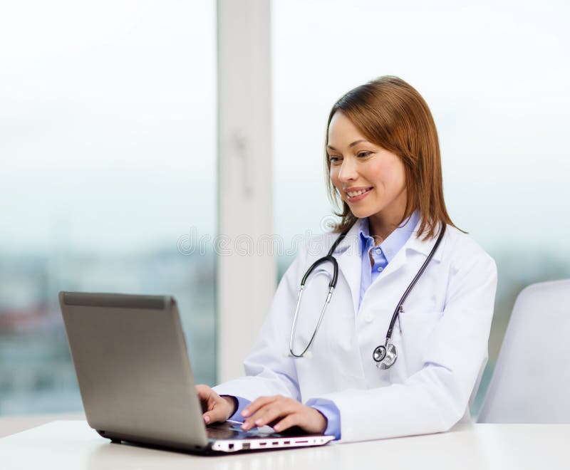 Busy Doctor with Laptop Computer Stock Photo - Image of employee ...