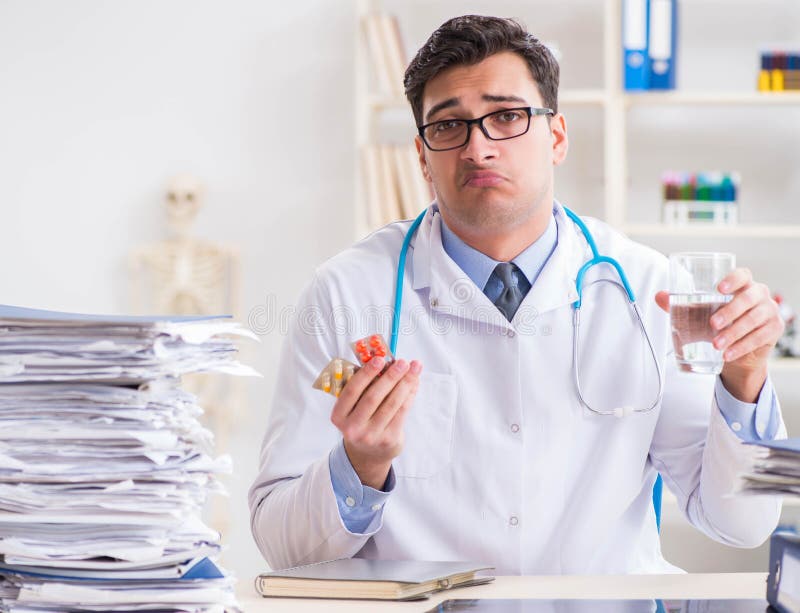 Busy Doctor with Too Much Work in Hospital Stock Image - Image of ...