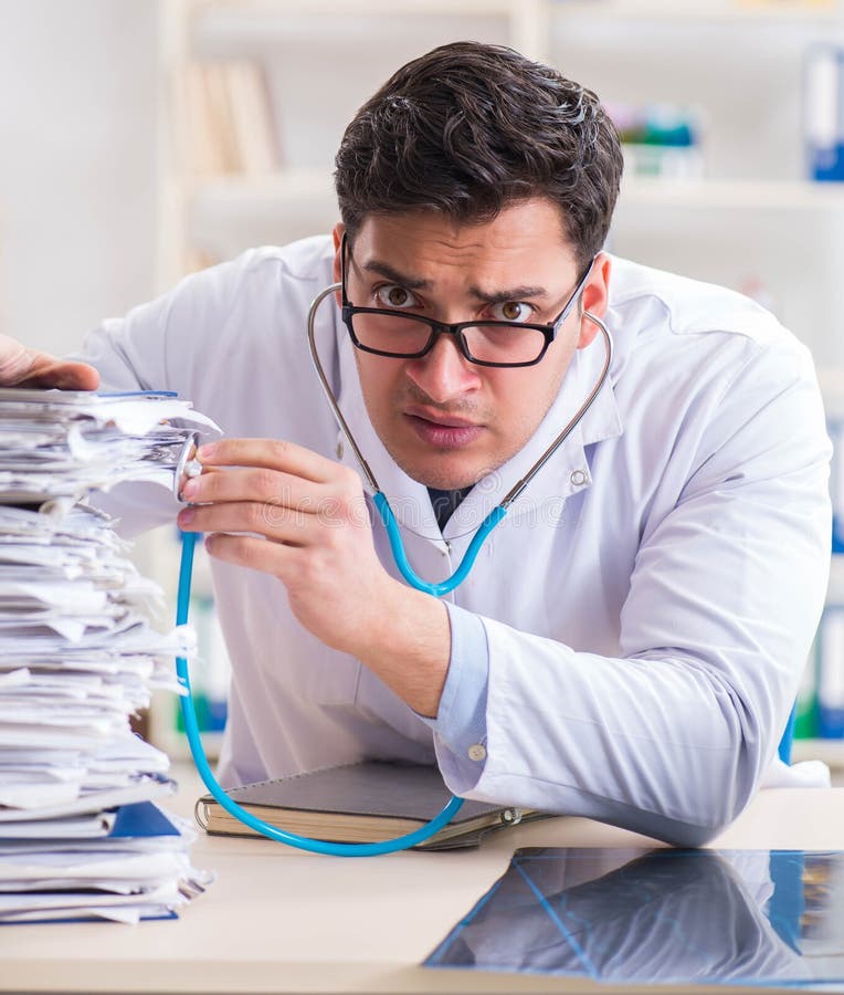 Busy Doctor with Too Much Work in Hospital Stock Photo - Image of ...